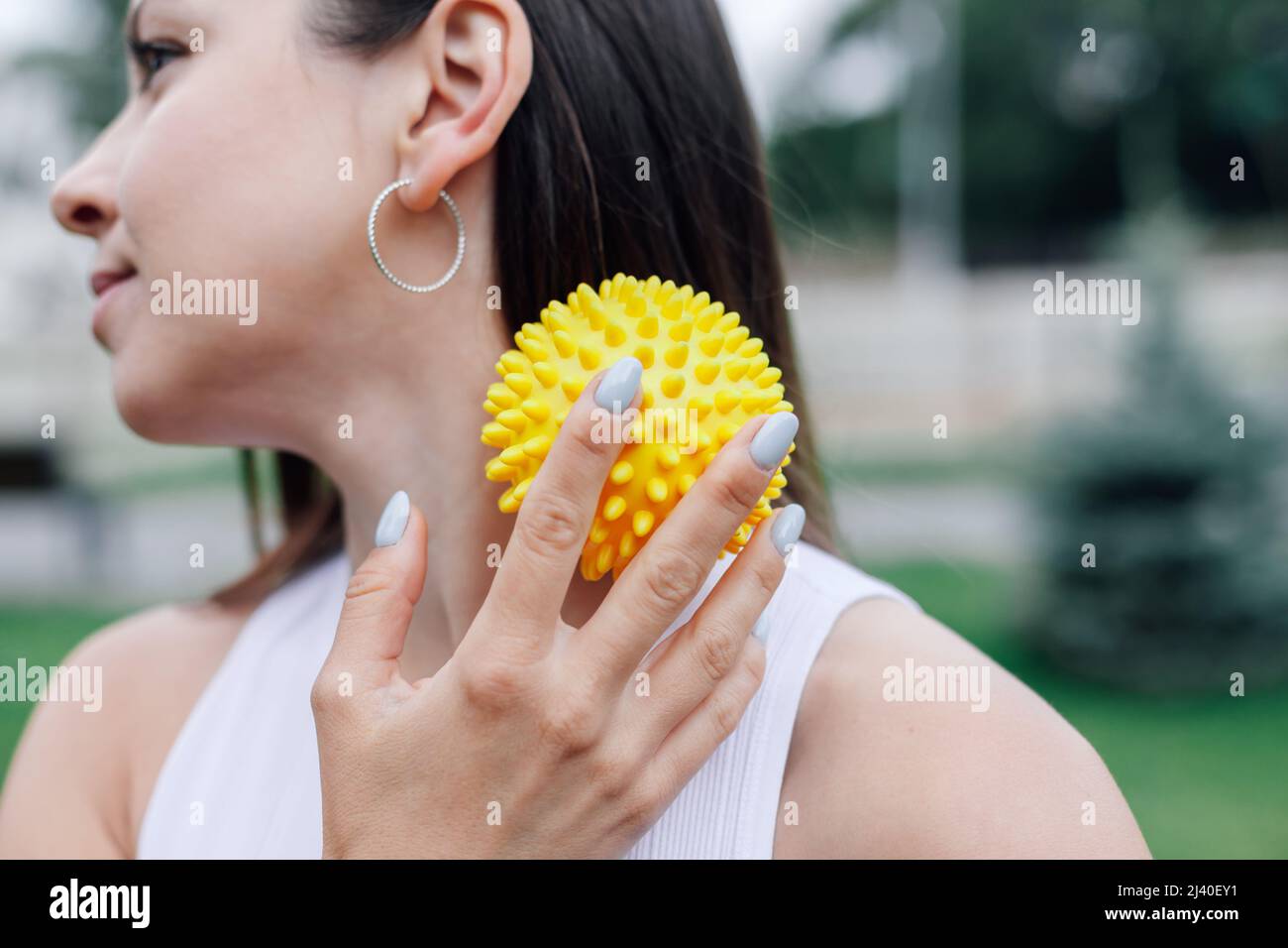 close - up portrait in profile of young woman face blured with spiky ...