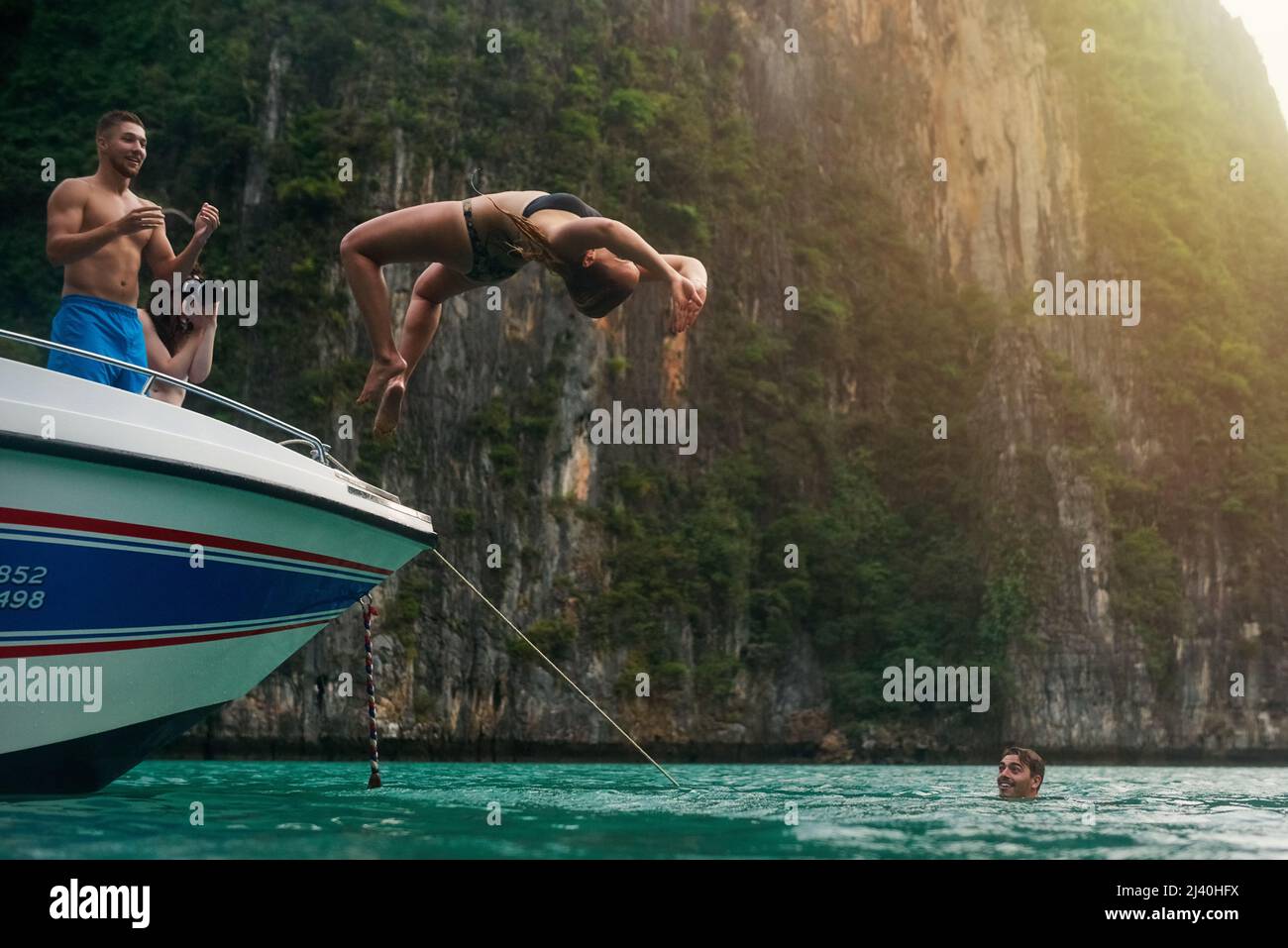 Jumping off boat hi-res stock photography and images - Alamy