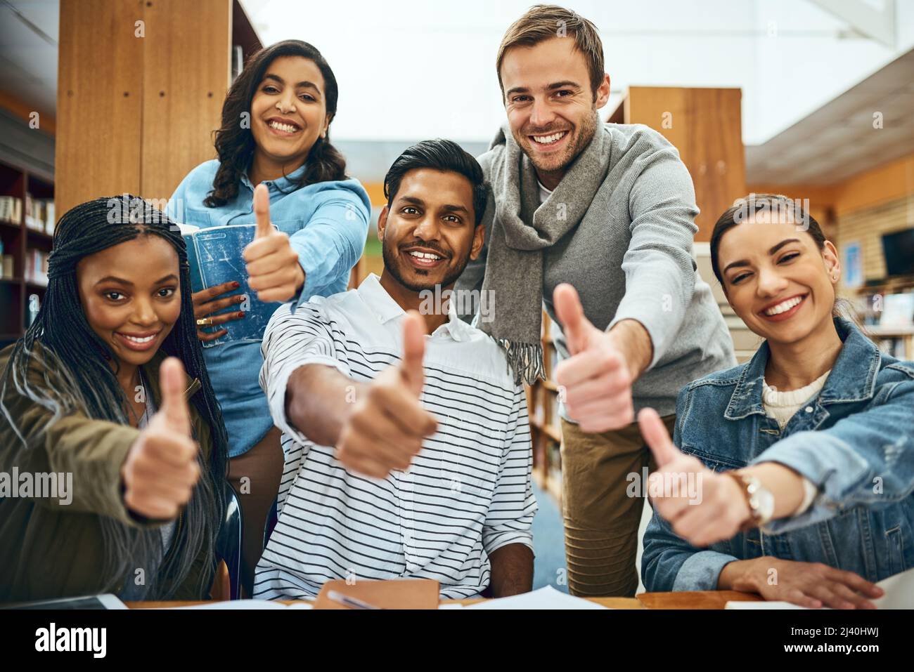 Our studies are going great. Cropped portrait of a group of university ...