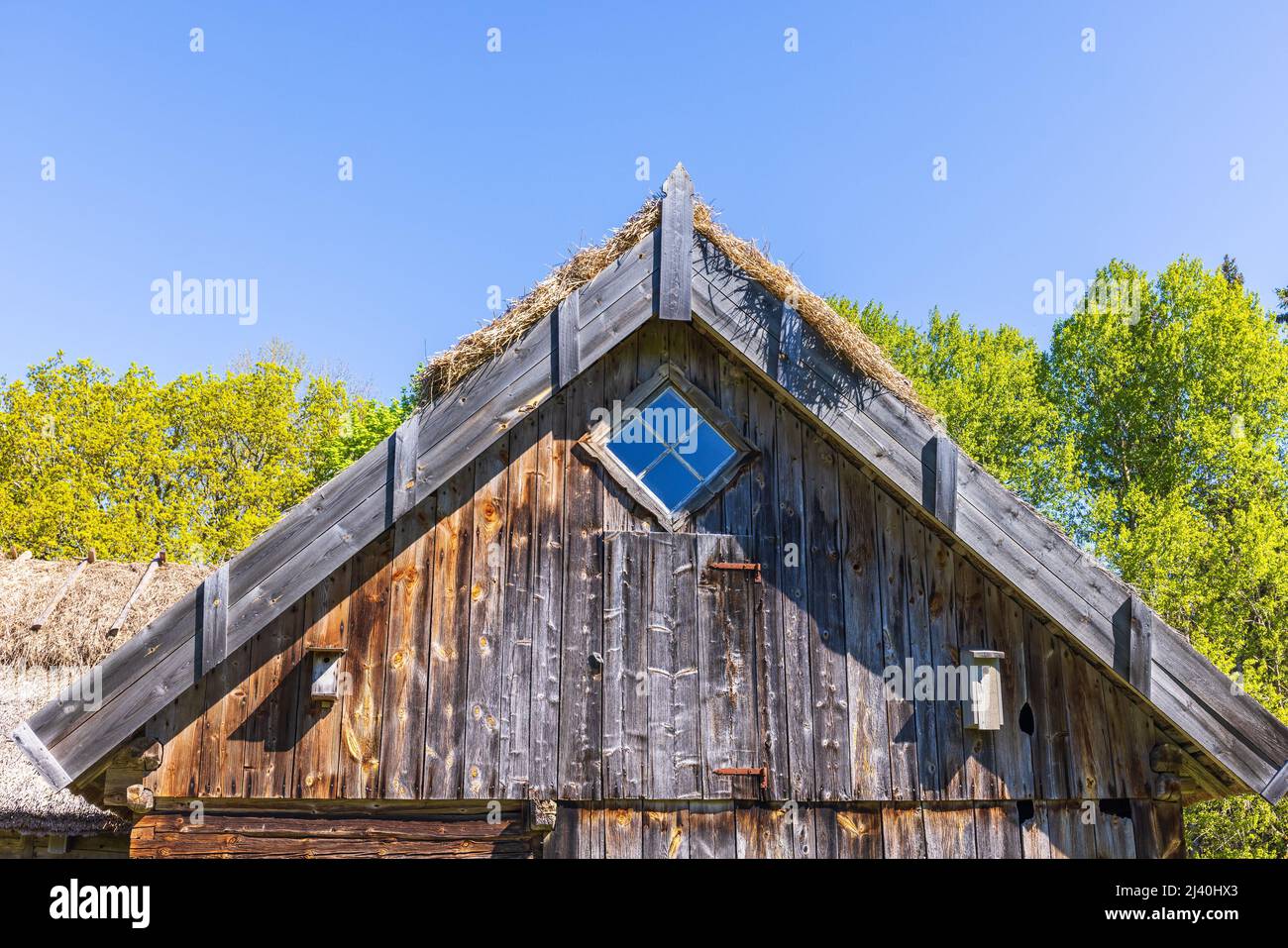 Gable on an old wooden barn Stock Photo - Alamy