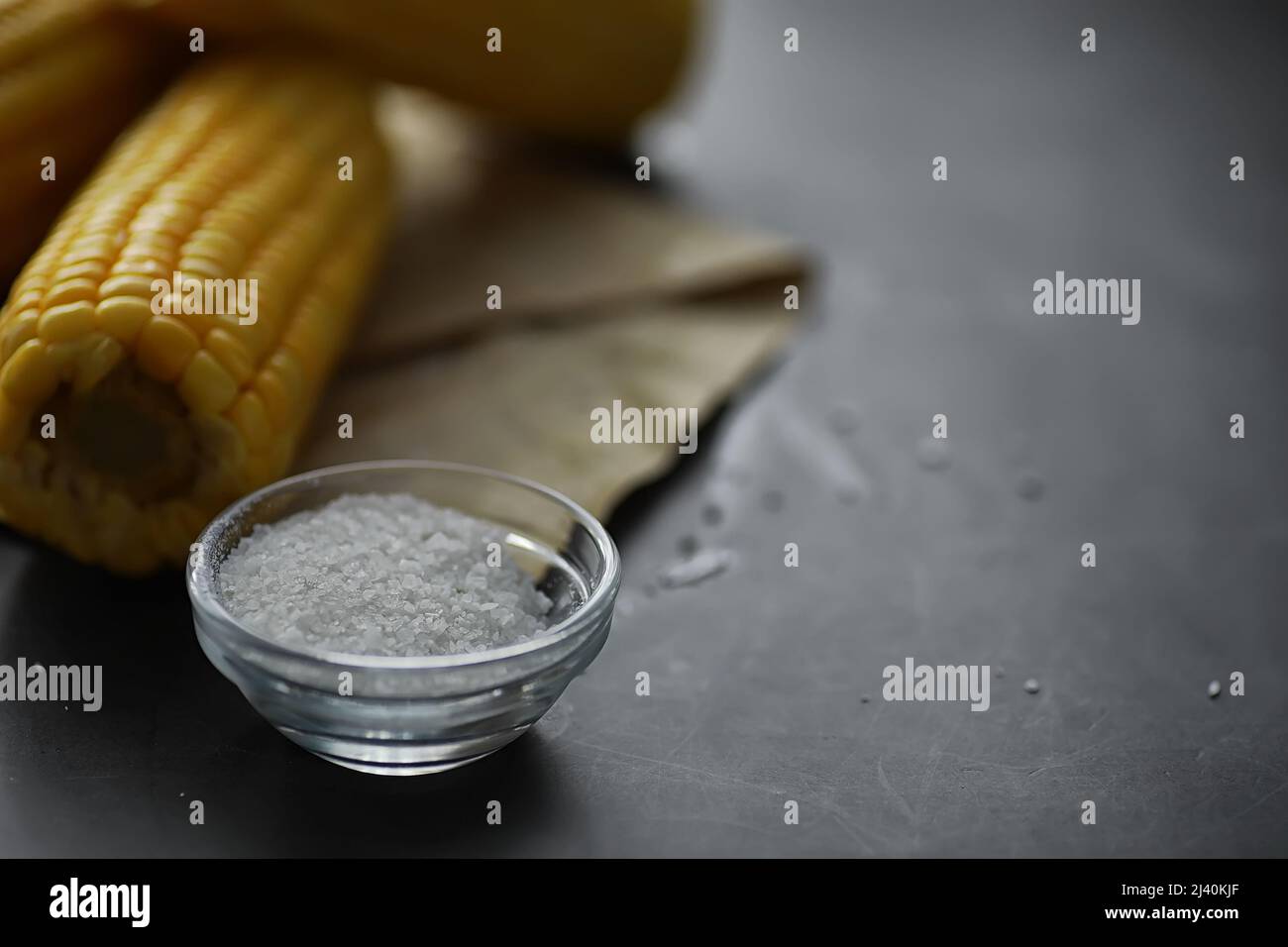 Freshly made fragrant ear of corn with salt. Farm snack fresh corn ...
