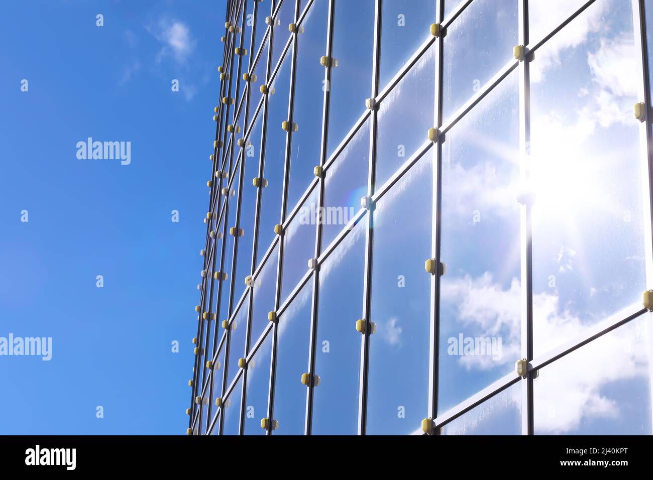 Architectural detail of the facade with multiple reflections of other ...
