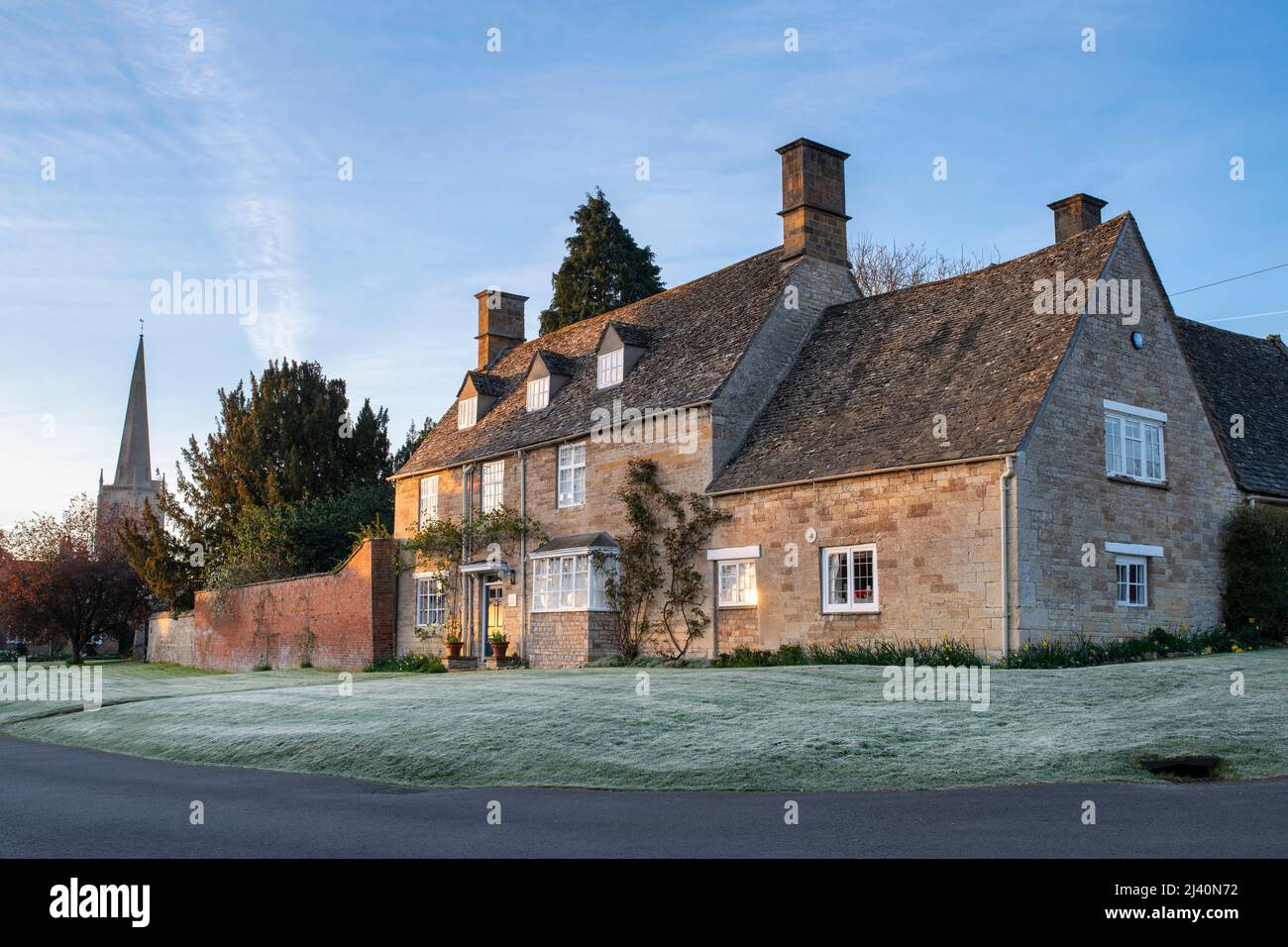 Large house at sunrise on a frosty spring morning. Tredington ...