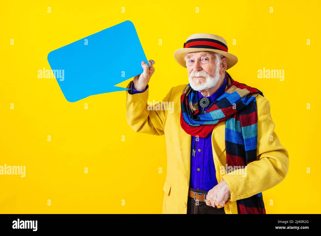 Cool senior man with fashionable clothing style portrait on colored ...