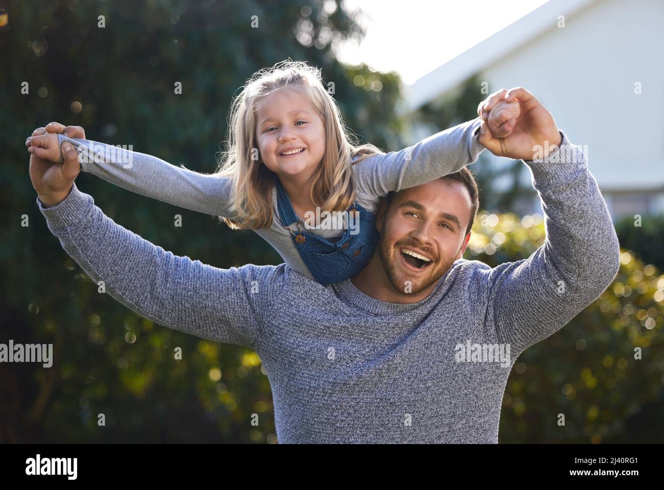 We always make time for fun and play. Portrait of a little girl having ...