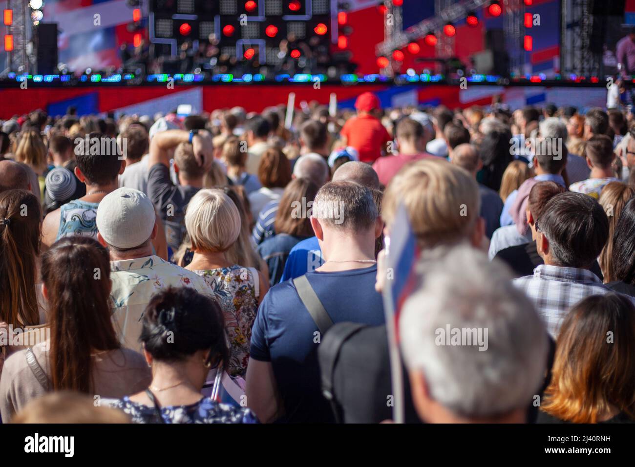 A lot of people at a big event. People at the concert. A crowd of ...