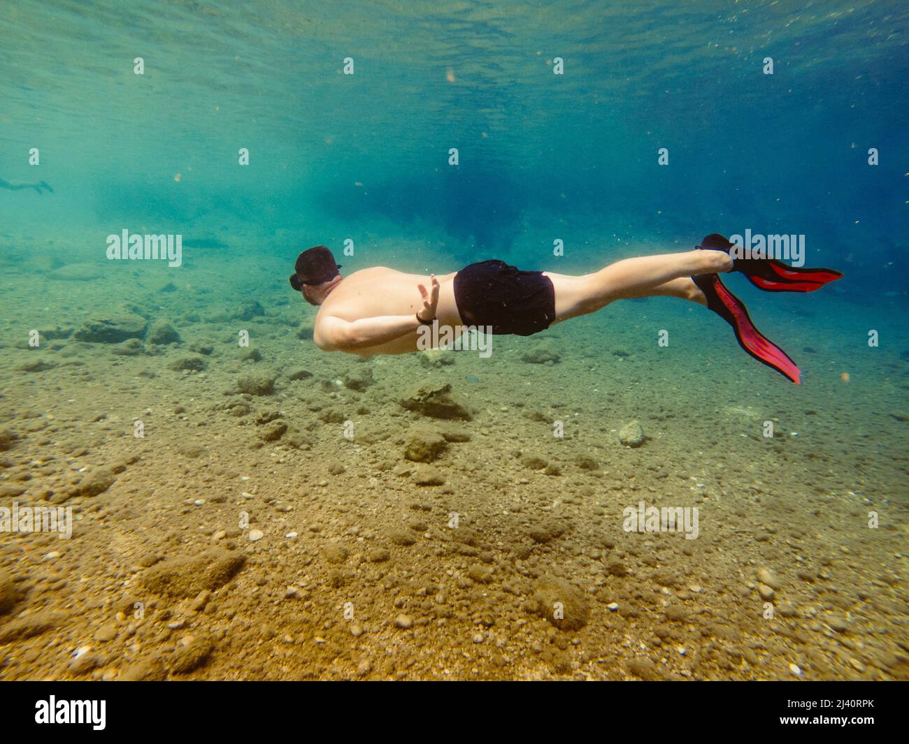 man in diving mask snorkeling in sea water greece vacation Stock Photo ...