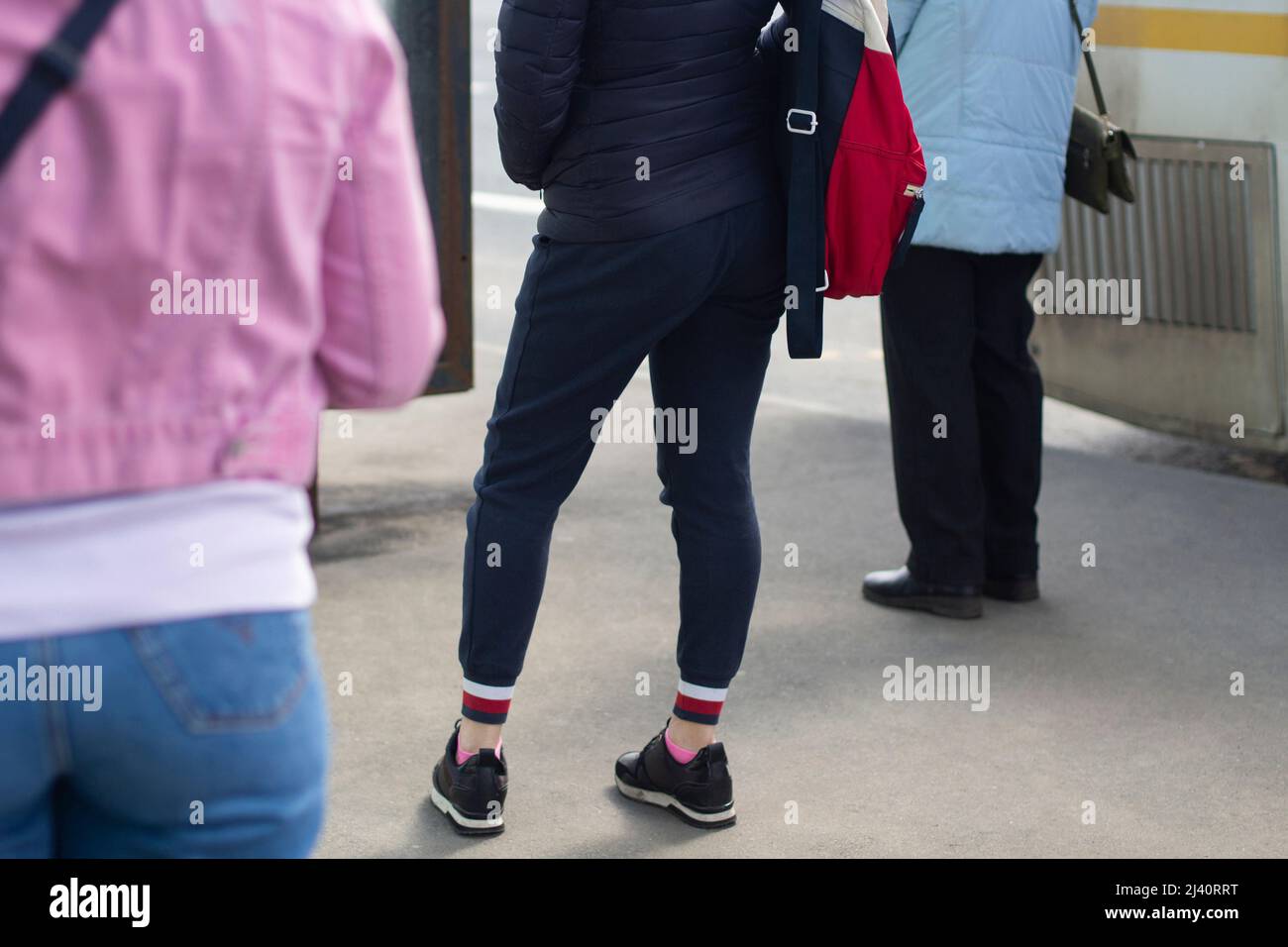 Females waiting for bus hi-res stock photography and images - Alamy