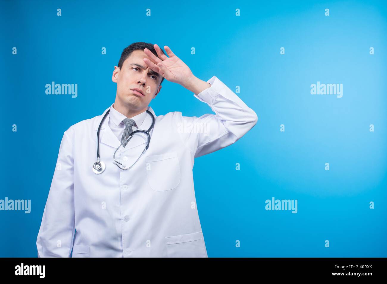 Exhausted upset doctor in hi-res stock photography and images - Alamy