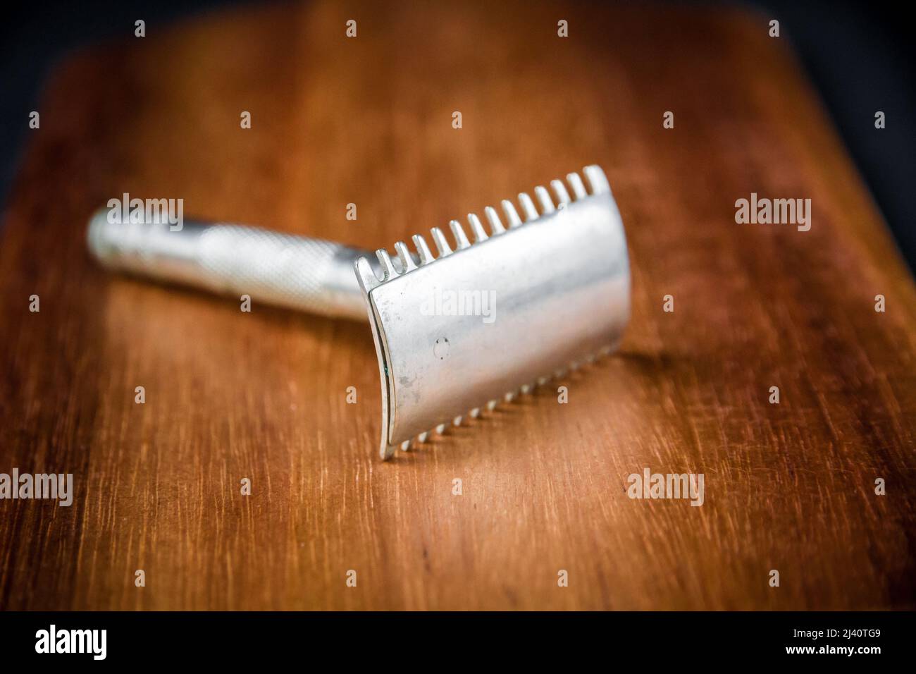 Old classic vintage shaver razor on a wooden background Stock Photo - Alamy