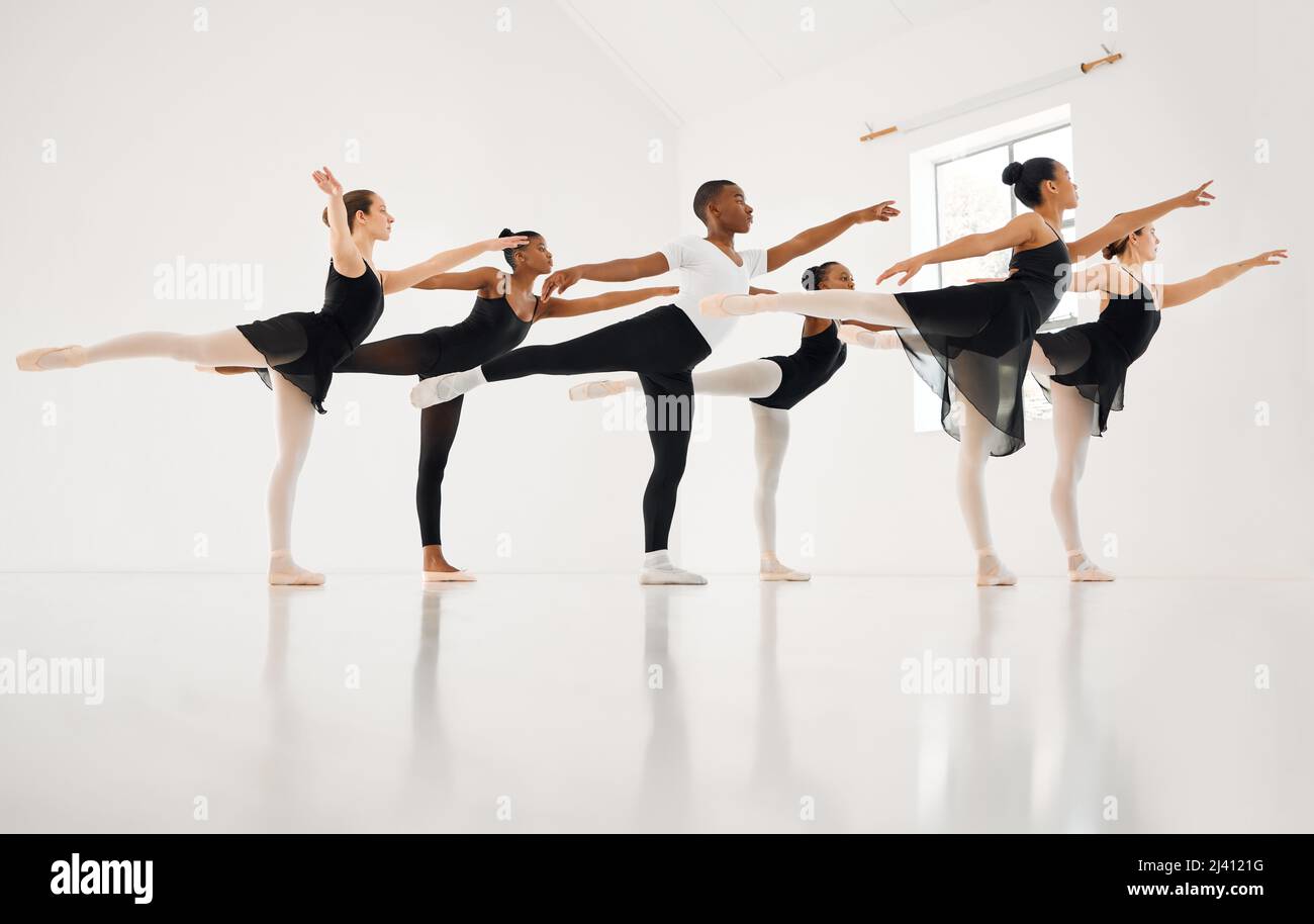 Dance, if youve torn the bandage off. Shot of a group of ballet dancers ...