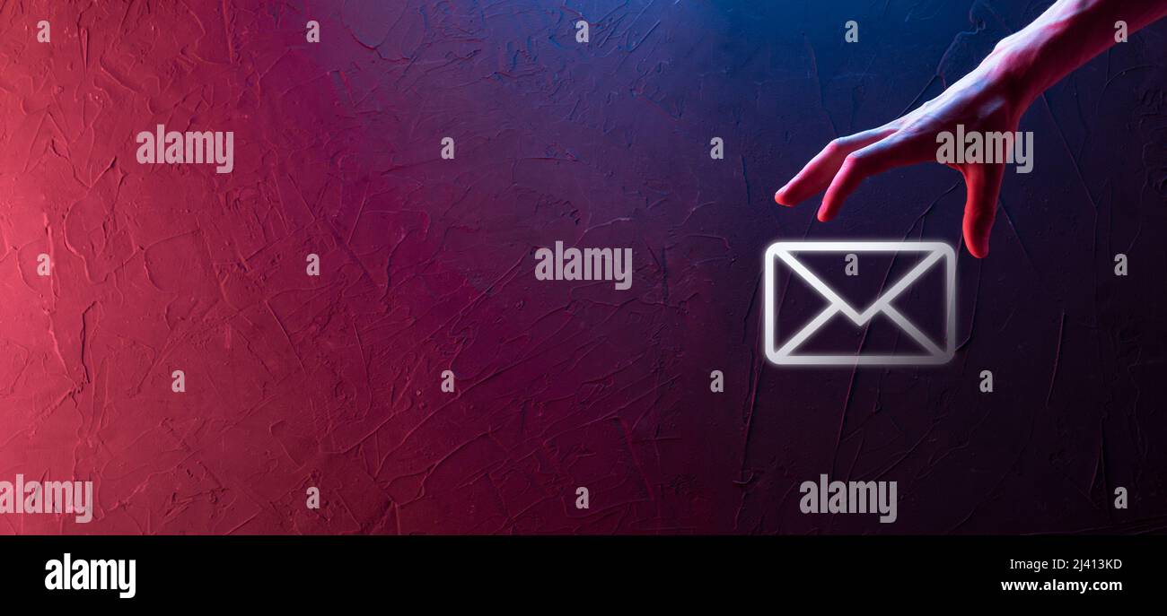 Businessman hand holding e-mail icon, Contact us by newsletter email ...