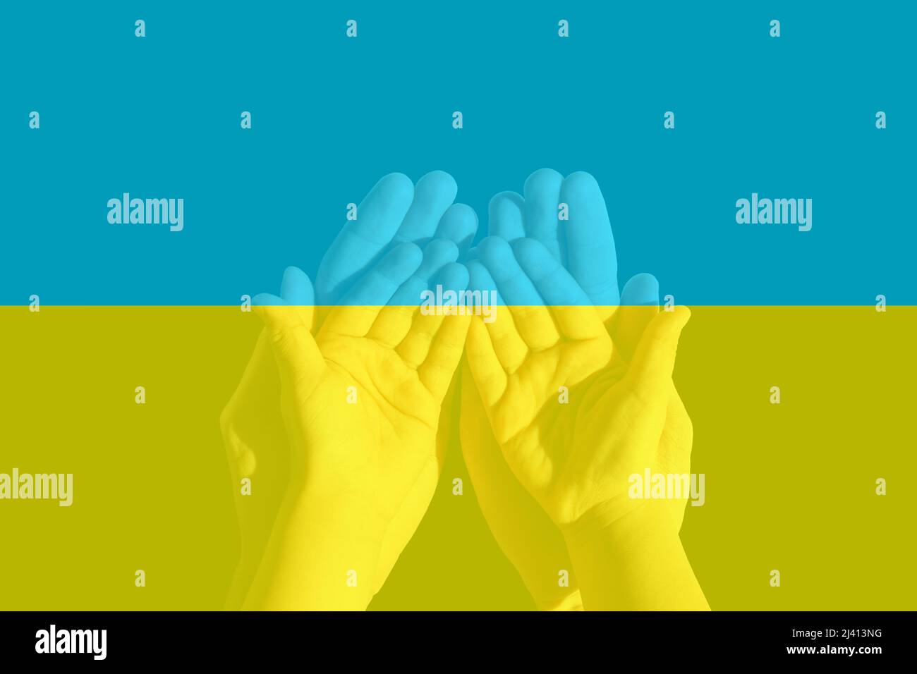 Pray for Ukraine. hand in prayer and the Ukrainian flag in the ...
