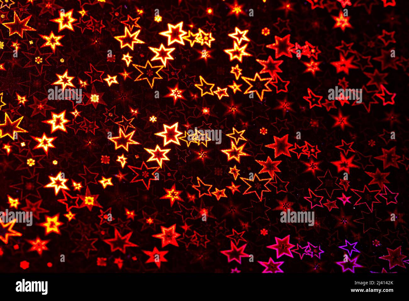 red holographic stars abstract patterned background for design purpose ...