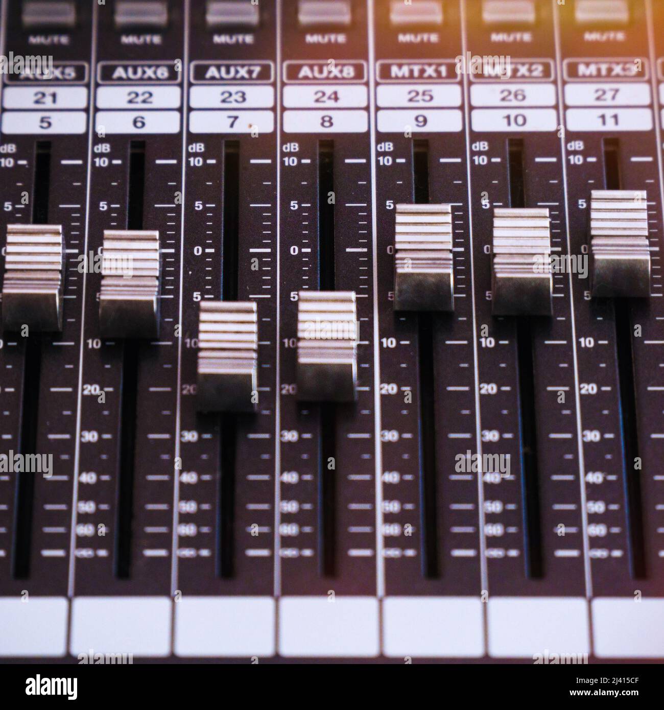 Faders and control buttons on the mixing console. Selective focus Stock ...