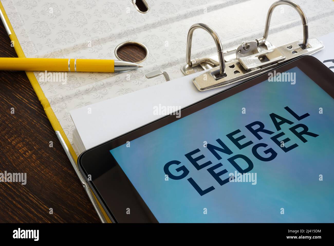 Folder and tablet with general ledger data Stock Photo - Alamy