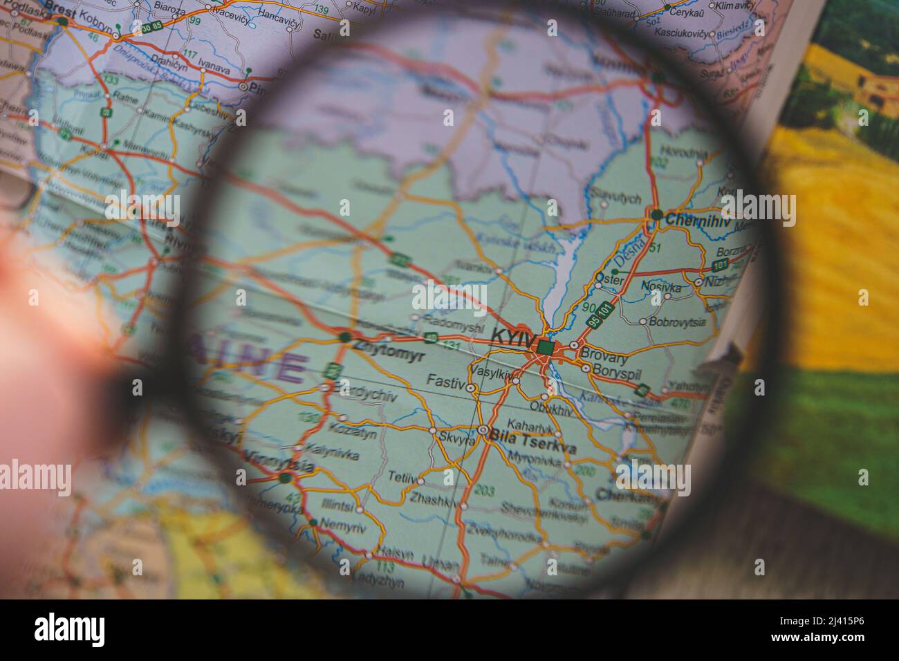 Ukraine on map. Ukraine through magnifying glass on paper map. Ukraine ...