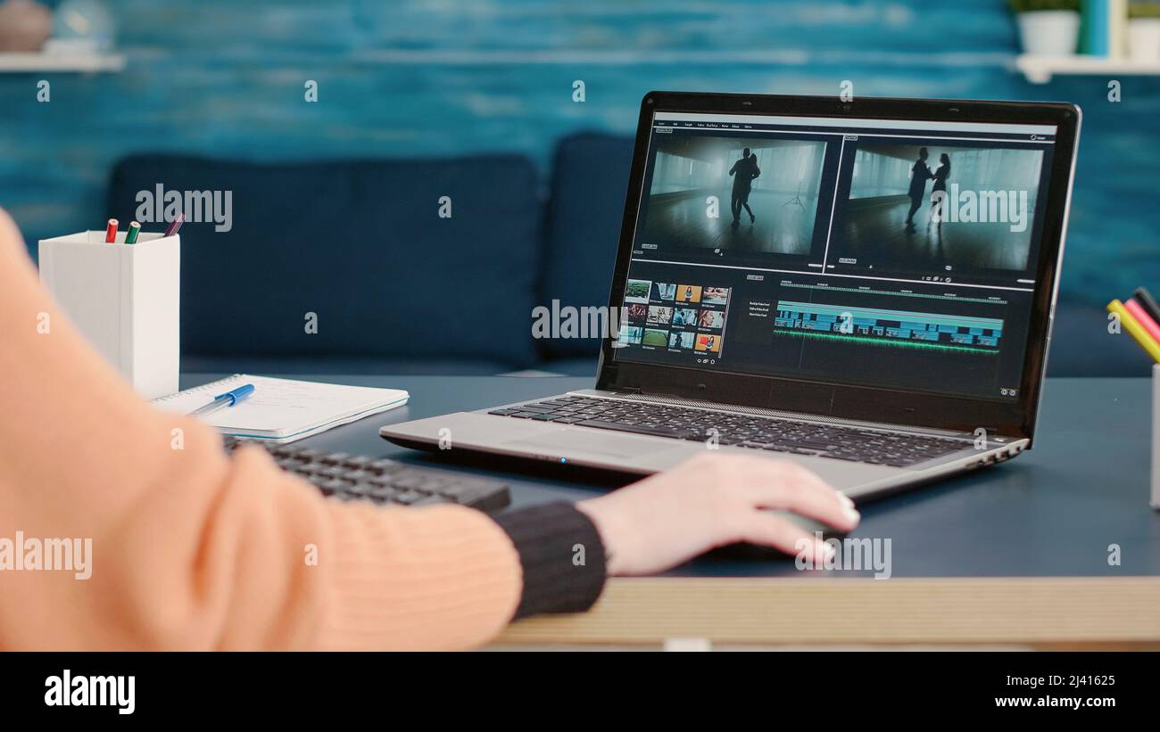 Content creator editing video montage on film production software ...