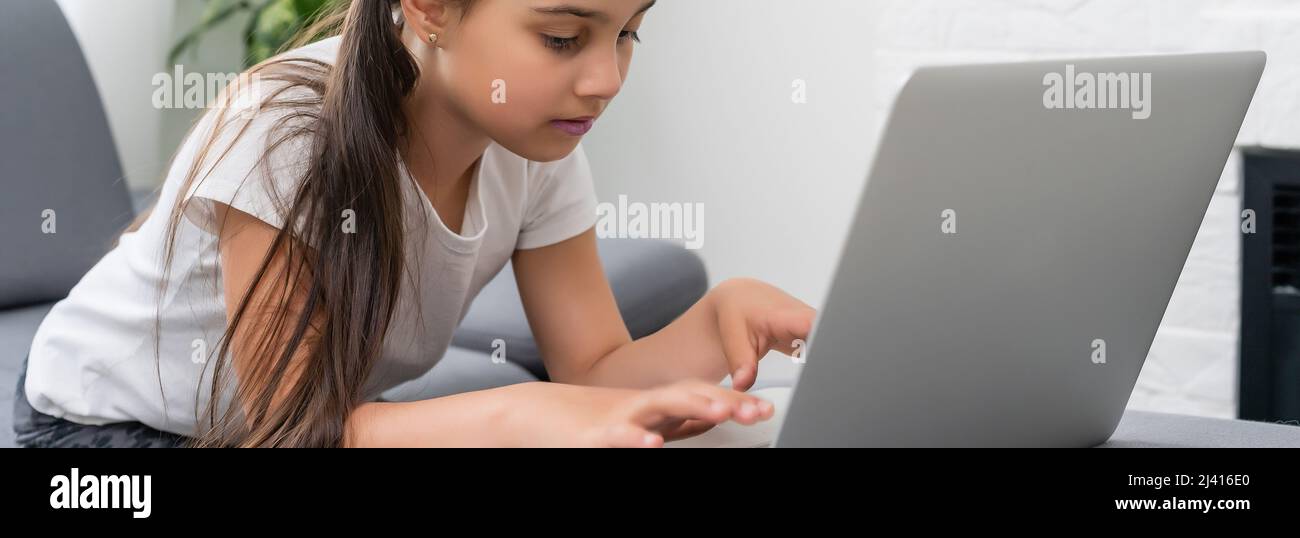 little girl studying with computer, little girl with laptop online ...