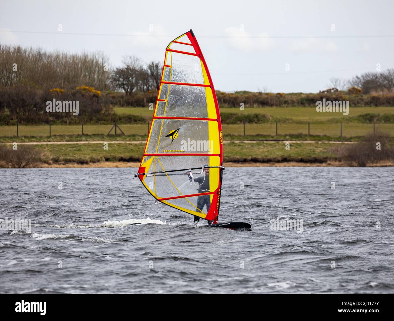 People wind foiling on Stithians Lake, Menherion in South West Cornwall ...