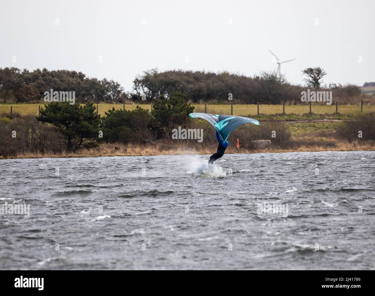 People wind foiling on Stithians Lake, Menherion in South West Cornwall ...