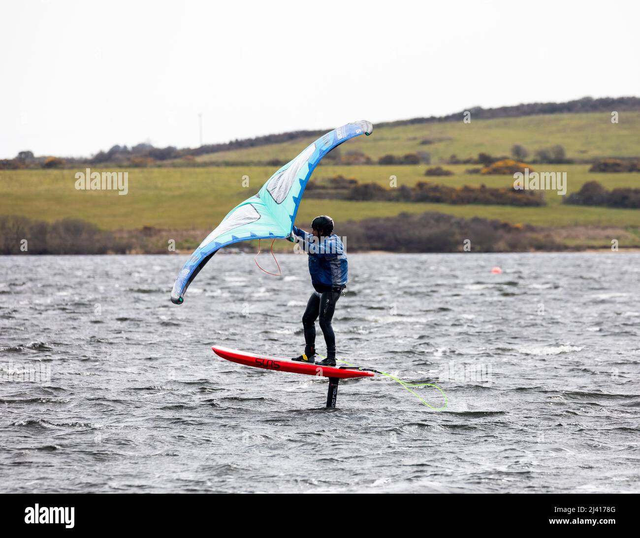 People wind foiling on Stithians Lake, Menherion in South West Cornwall ...