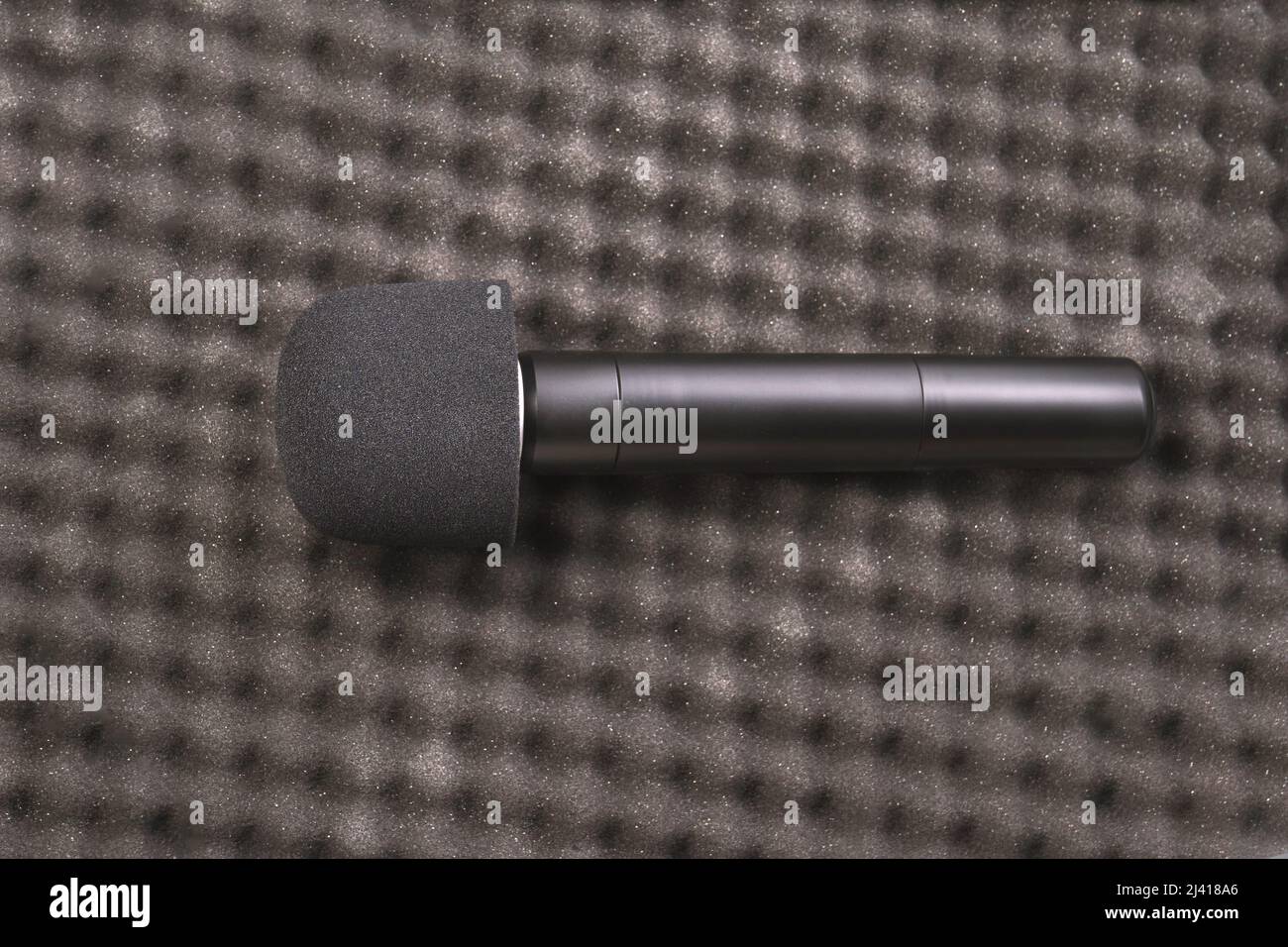 Podcast concept. Black microphone recorder, content notebook keypad ...