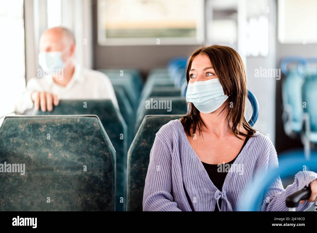 Happy mask commuters hi-res stock photography and images - Alamy