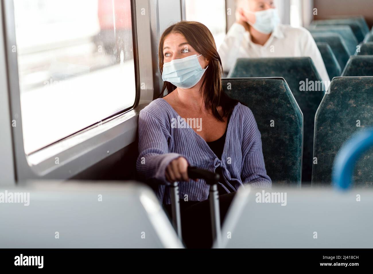 Masks pandemic public transport hi-res stock photography and images - Alamy