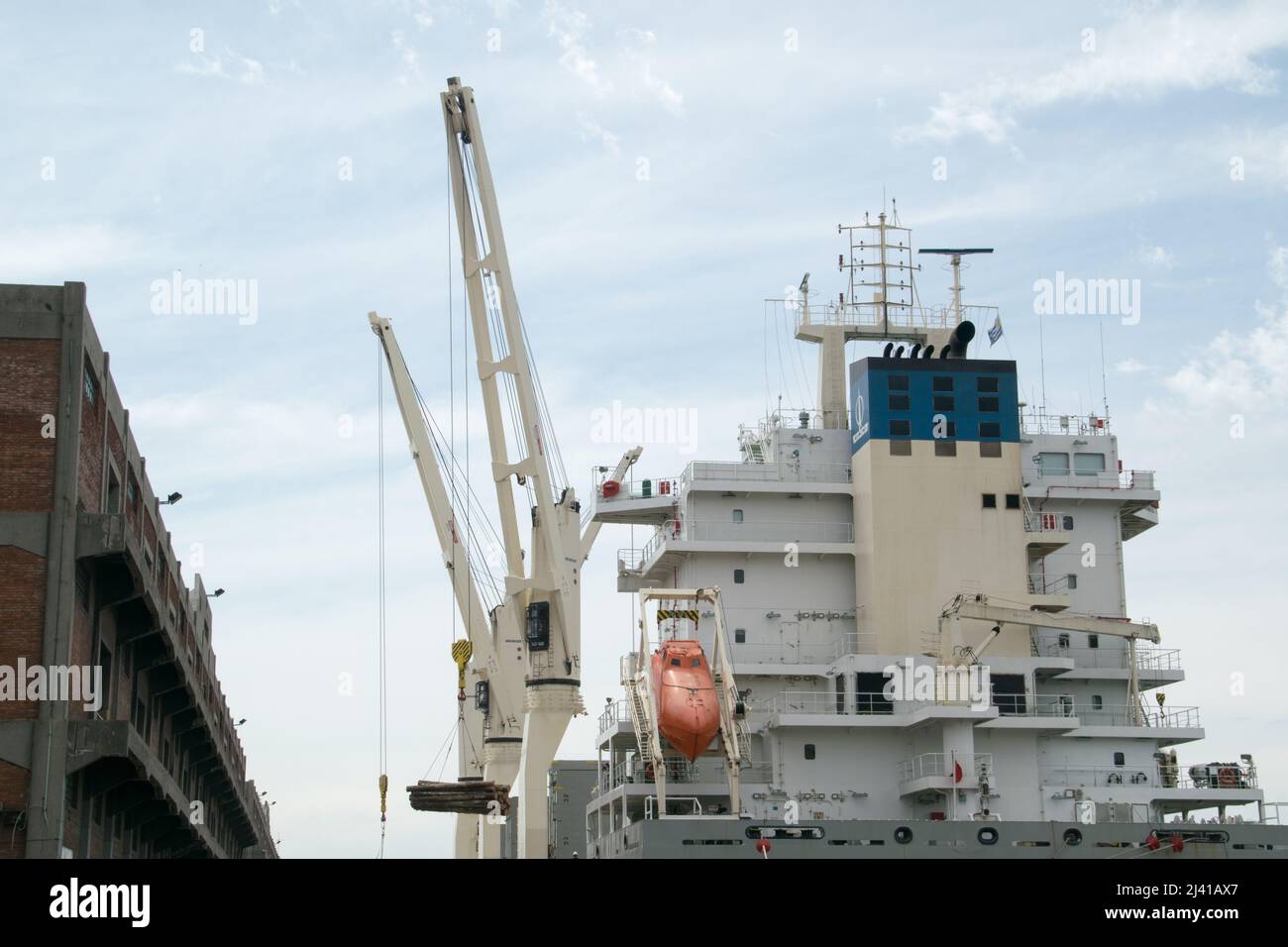 Large cargo ship full of containers in the port of Montevideo, Uruguay ...