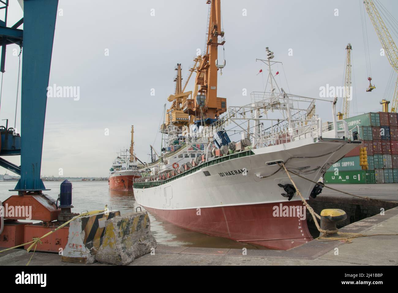 Large cargo ship full of containers in the port of Montevideo, Uruguay ...