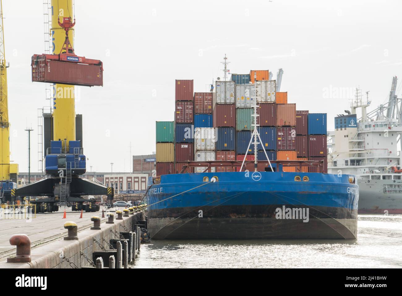 Large cargo ship full of containers in the port of Montevideo, Uruguay ...