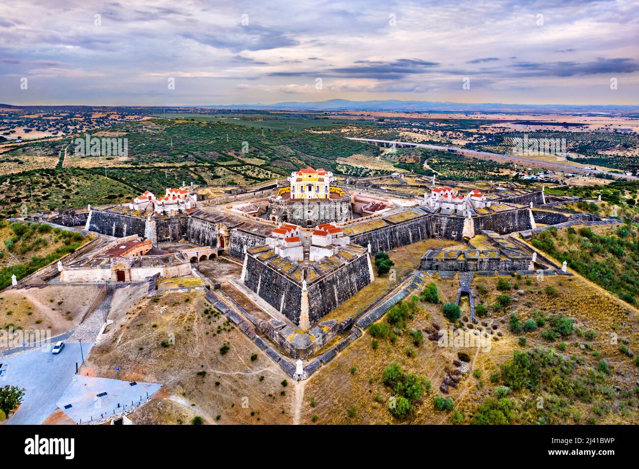 The Nossa Senhora da Graca Fort at sunset. UNESCO world heritage in ...