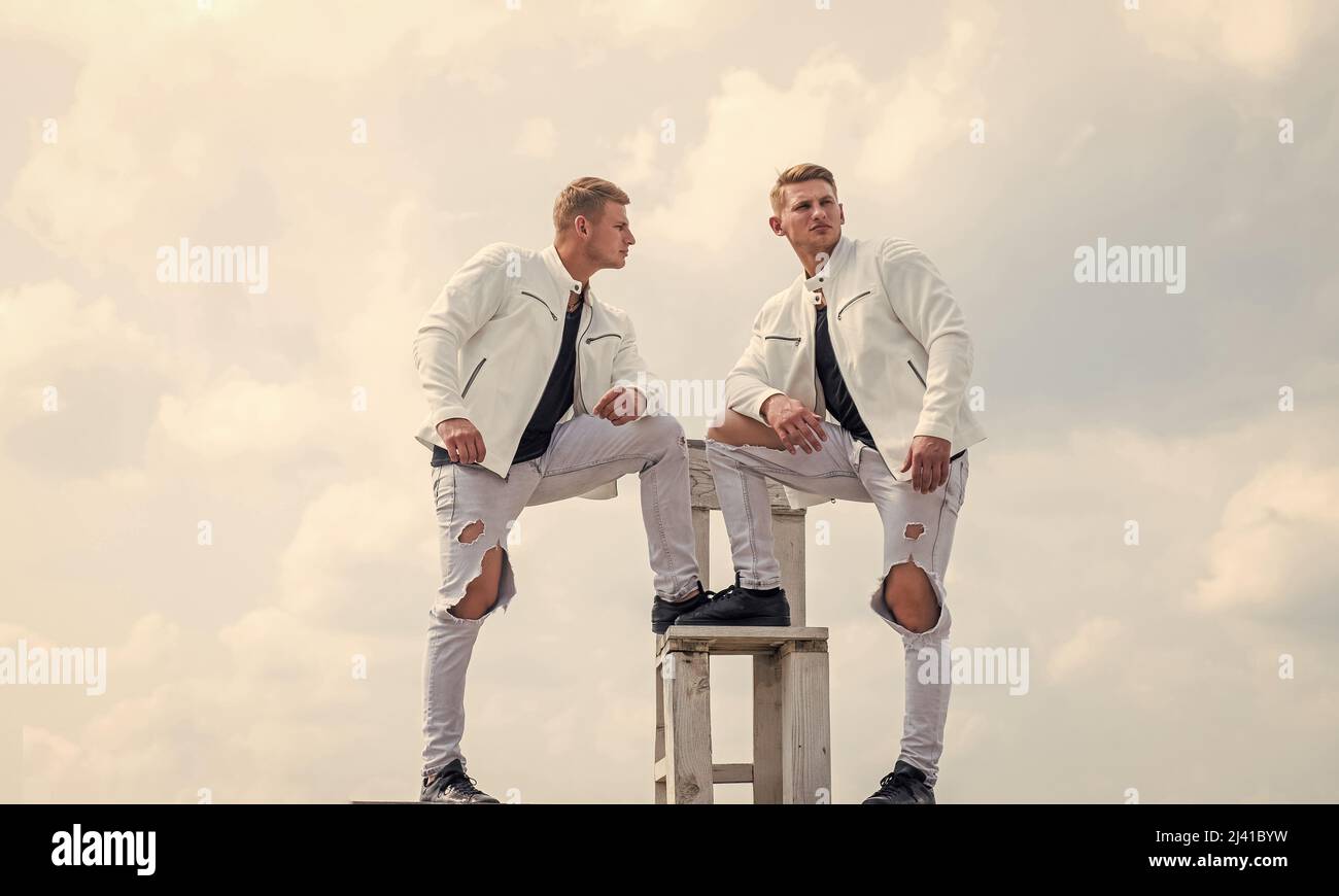 as a reflection of each other. similar appearance. family relations and ...