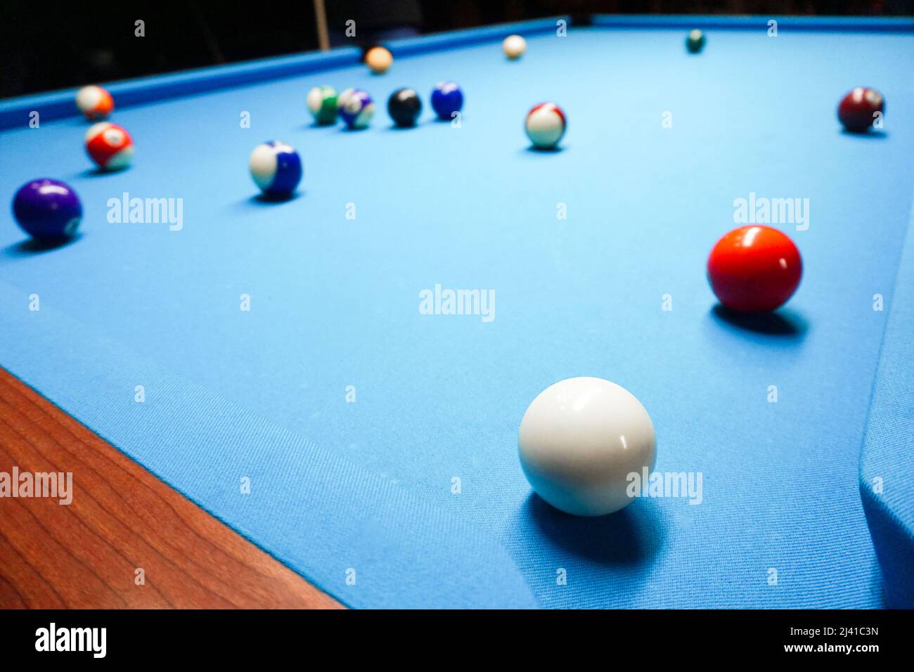 Billiards game - white and colorful balls on a table Stock Photo - Alamy