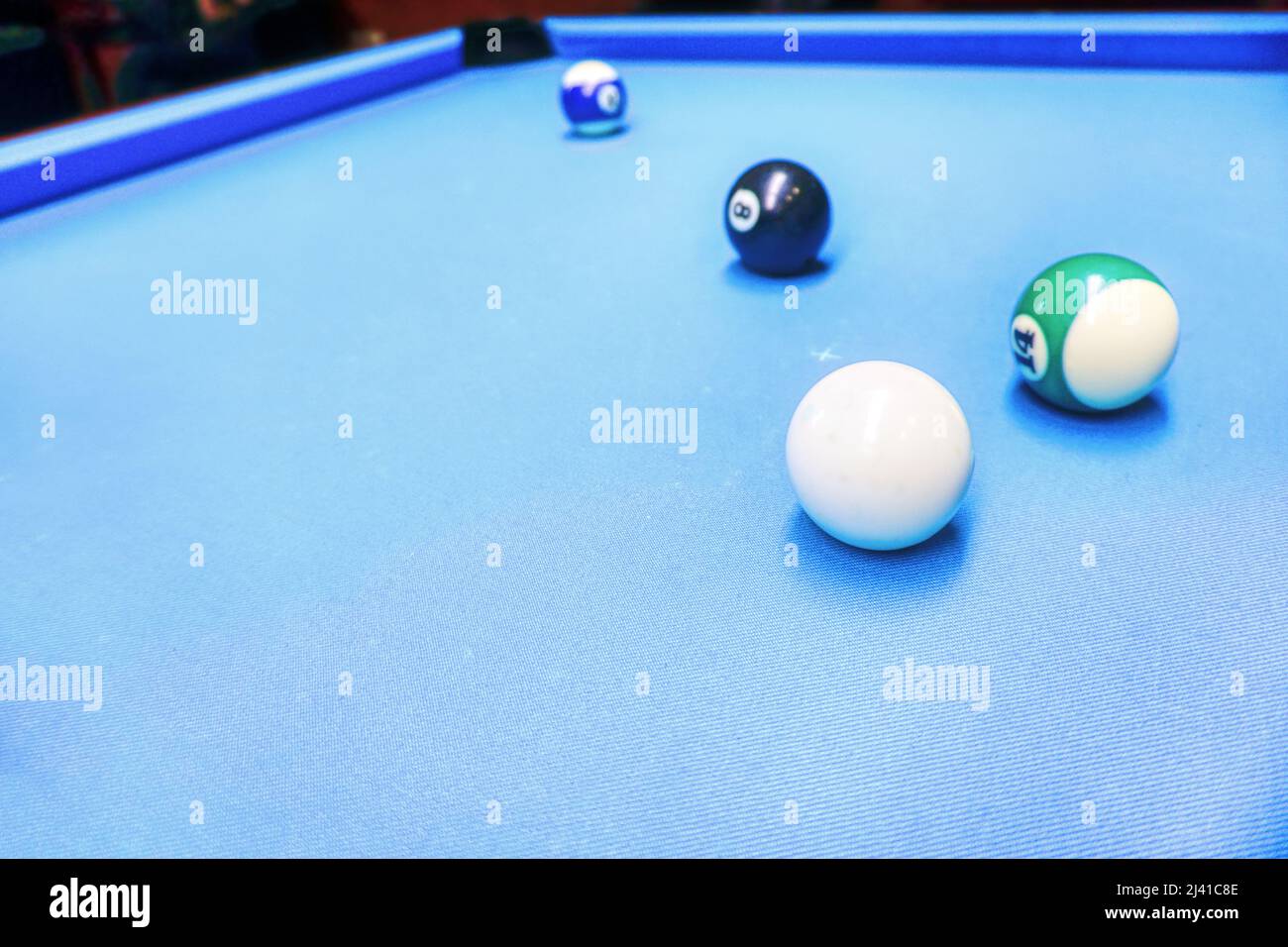 Billiards game - white, black and colorful balls on a table Stock Photo ...