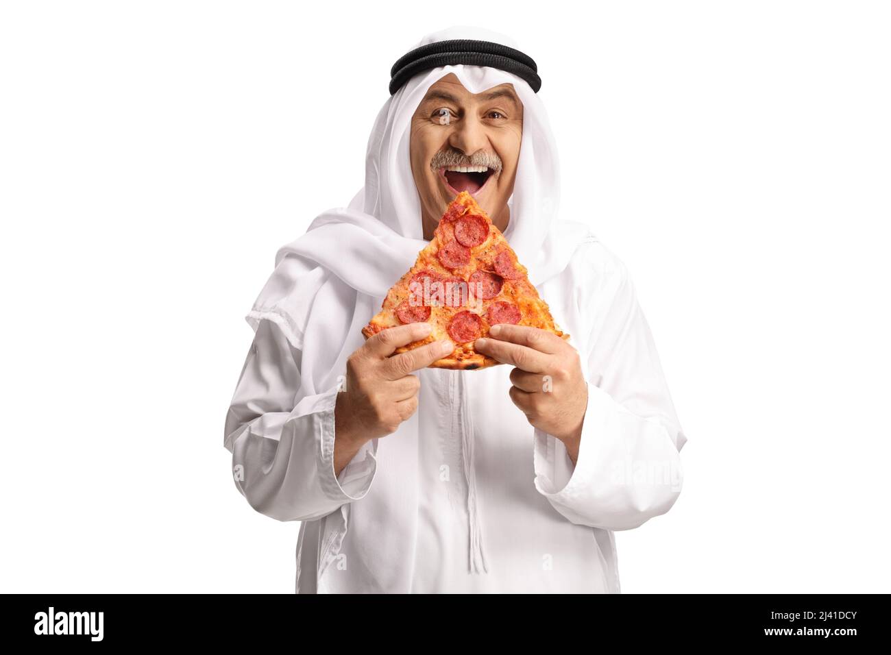Arab man in ethnic clothes eating pepperoni pizza and looking at camera ...