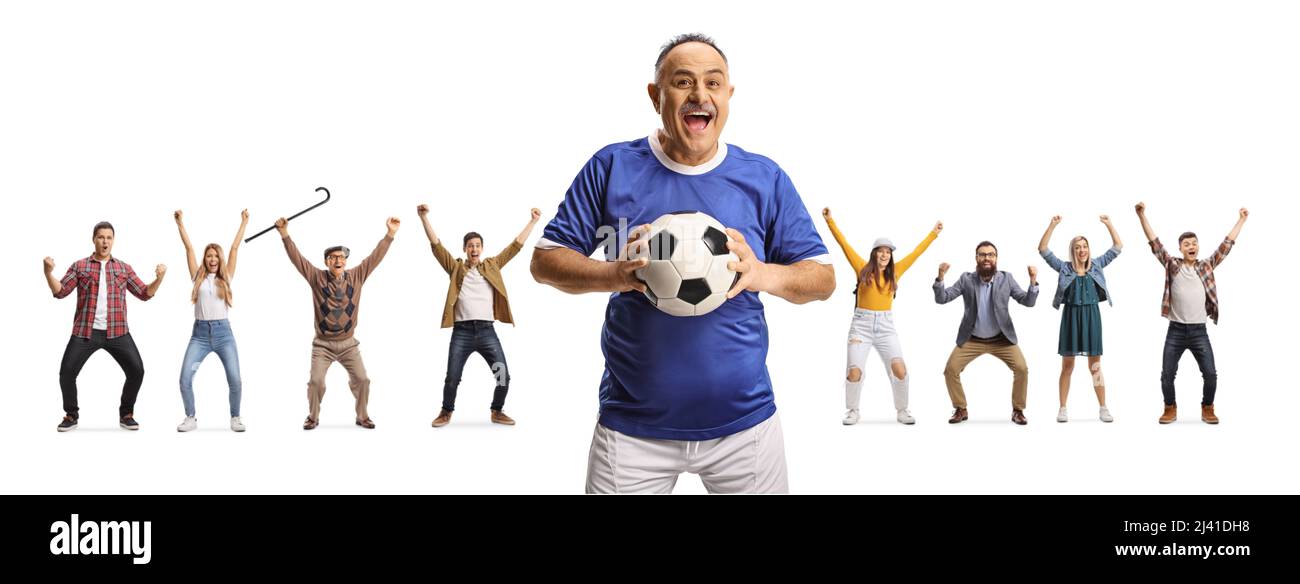 Mature man holding a football and people cheering in the back isolated ...
