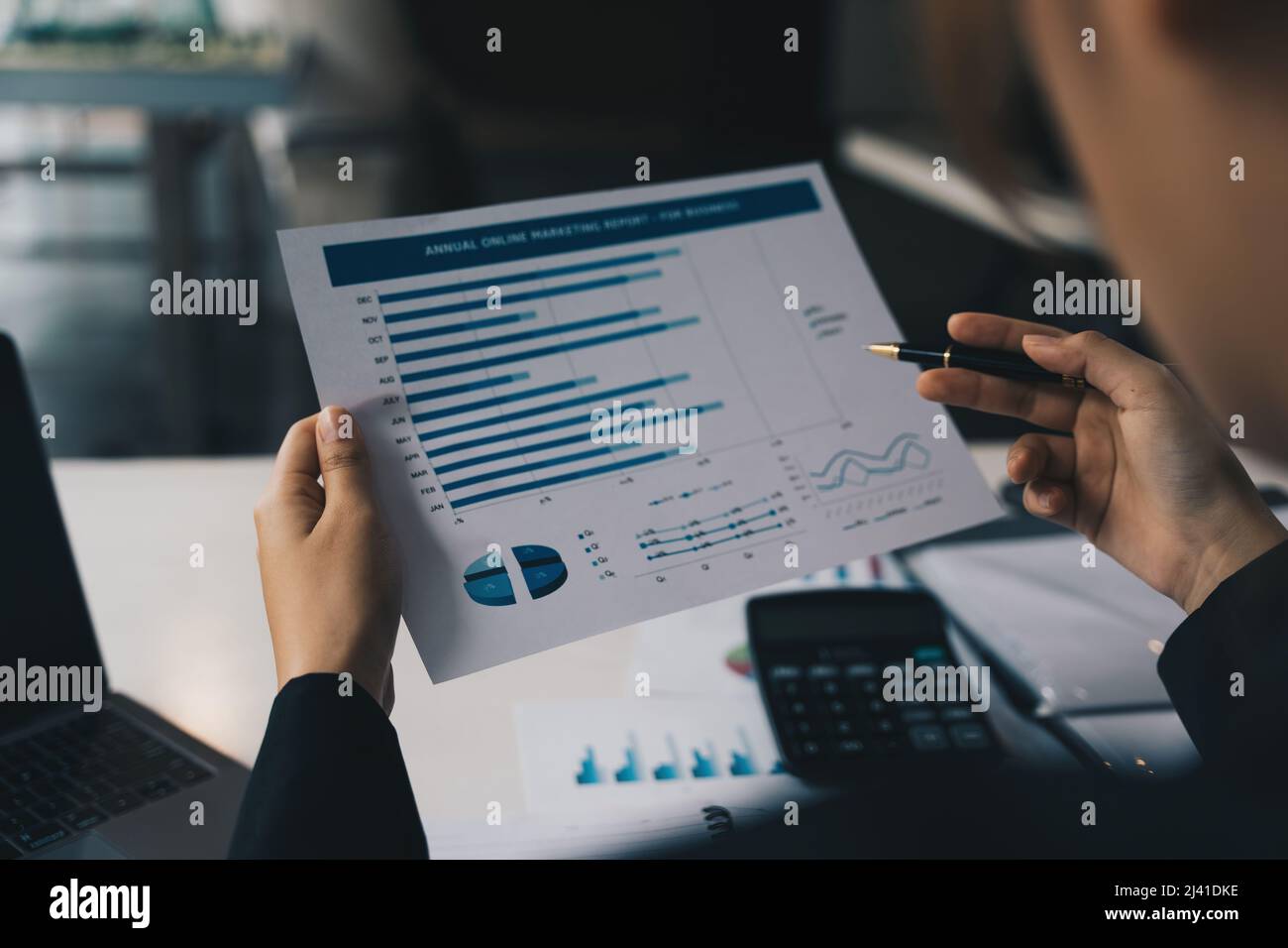 Close up Business woman hand using calculator to calculate the company ...