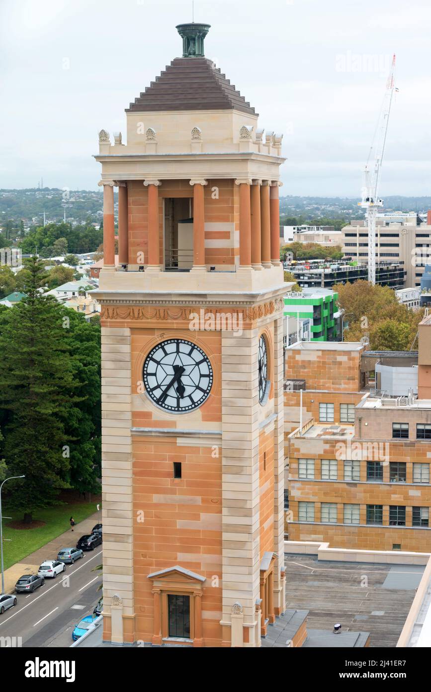 The clock tower for the Newcastle City Hall rising above King Street in ...