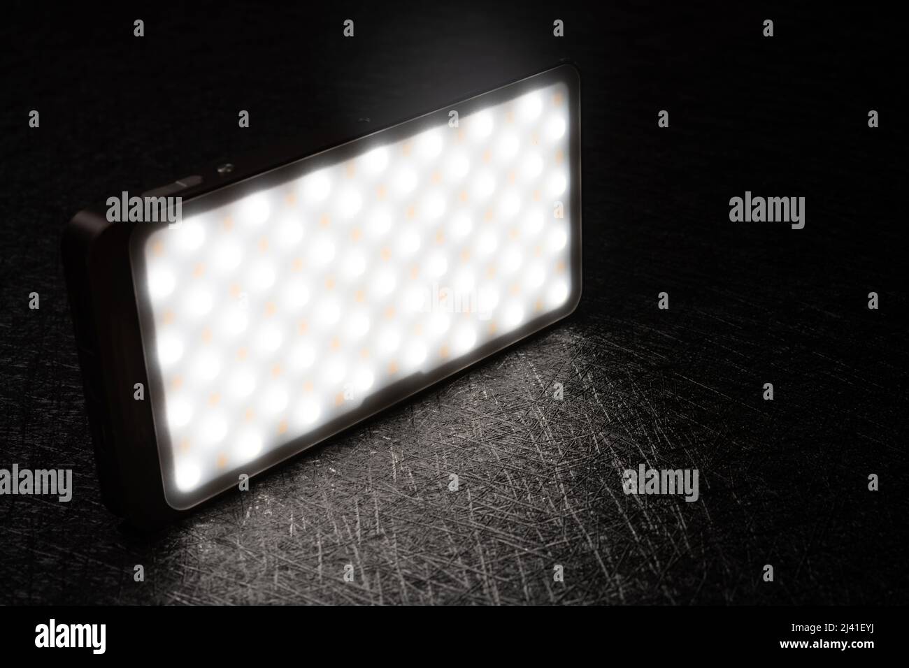 mini portable photography LED light on a dark background Stock Photo ...