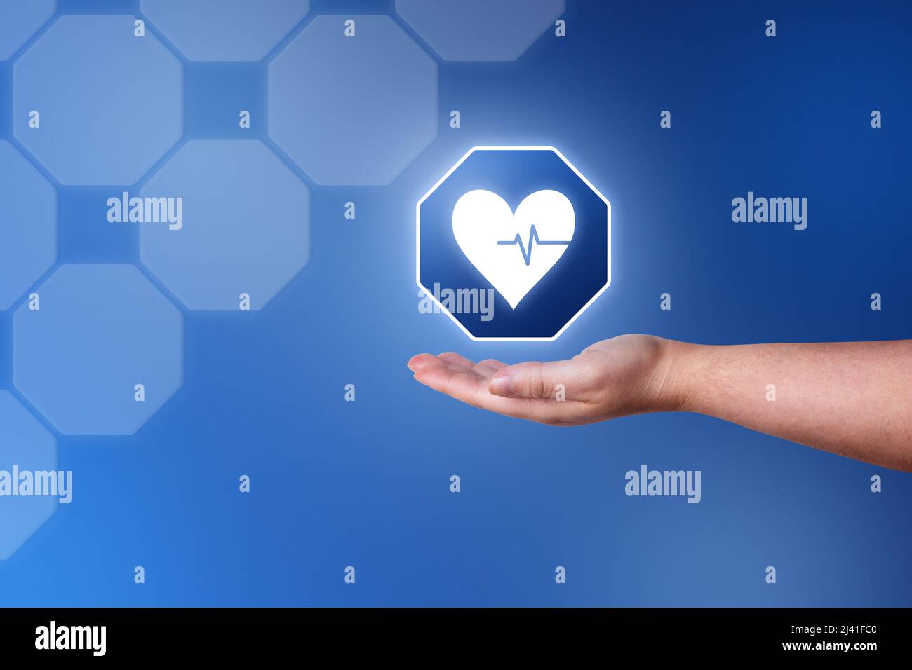 Woman hand showing blue medical shield with icon heart. Health care ...