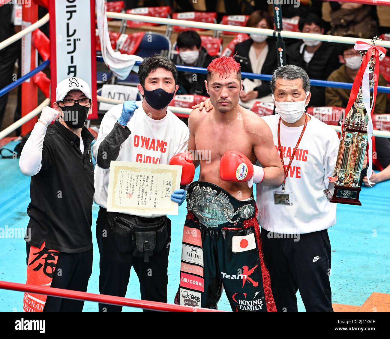 Tokyo, Japan. 2nd Apr, 2022. Makoto Kawasaki, second right, celebrates ...
