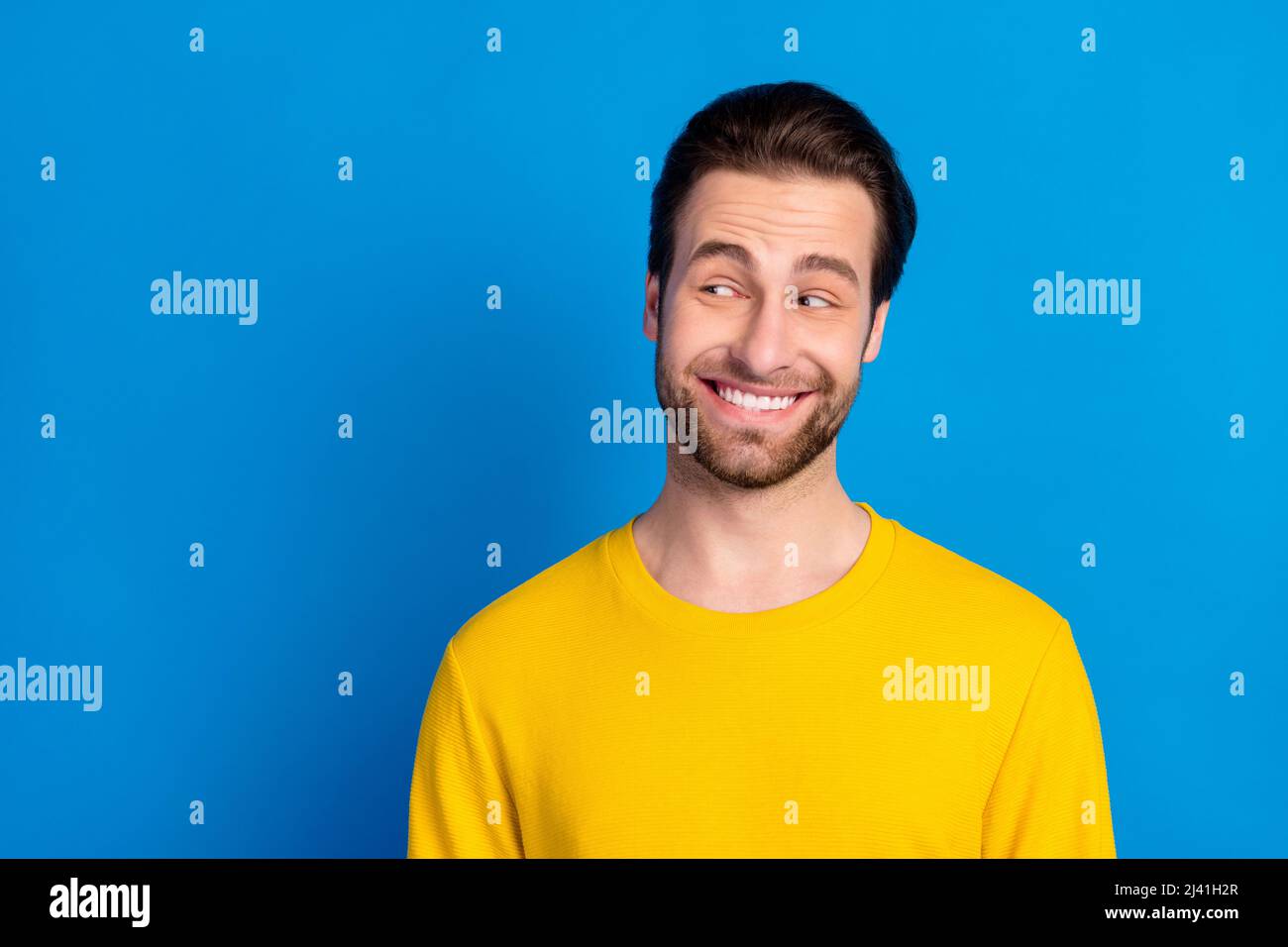 Portrait of attractive cheerful cunning bewildered brunet guy thinking ...