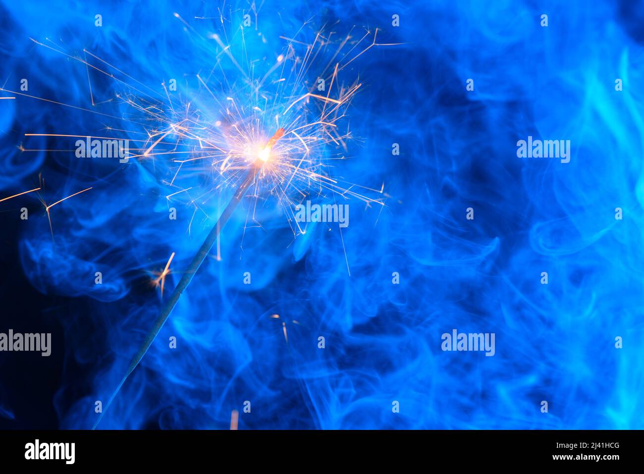 Bright burning sparkler bengal fire with smoke Stock Photo - Alamy
