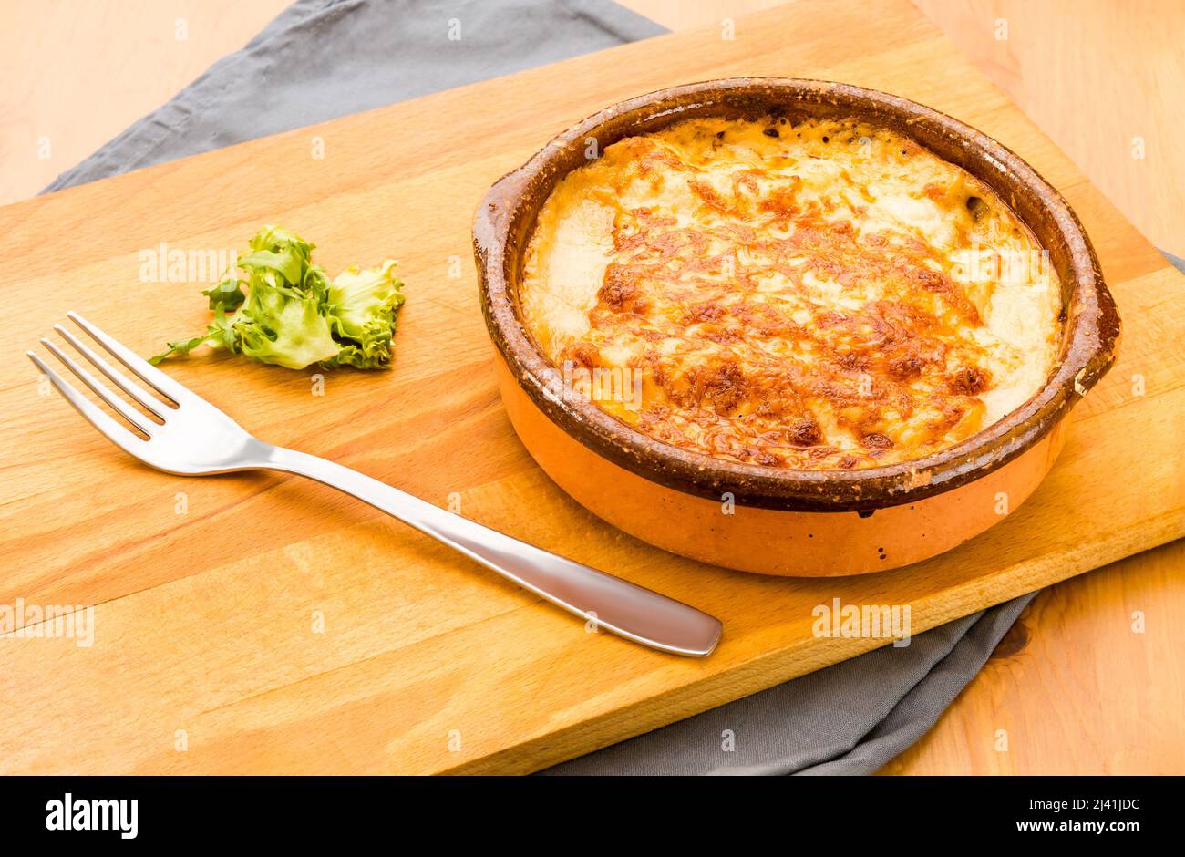 Typical Spanish food, meat lasagna au gratin with cheese Stock Photo ...