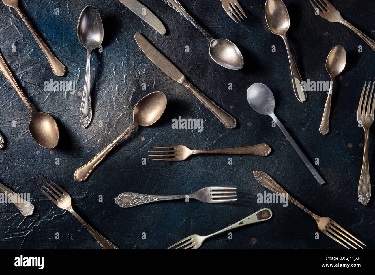 Cutlery pattern. Various forks, knives, and spoons, elegant tableware ...