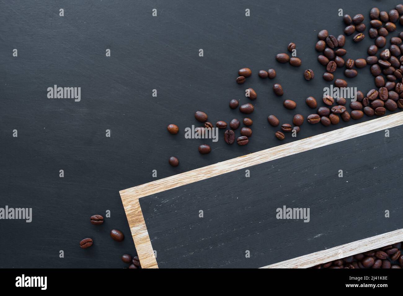 wooden sign and coffee beans on wooden table background. mockup and ...