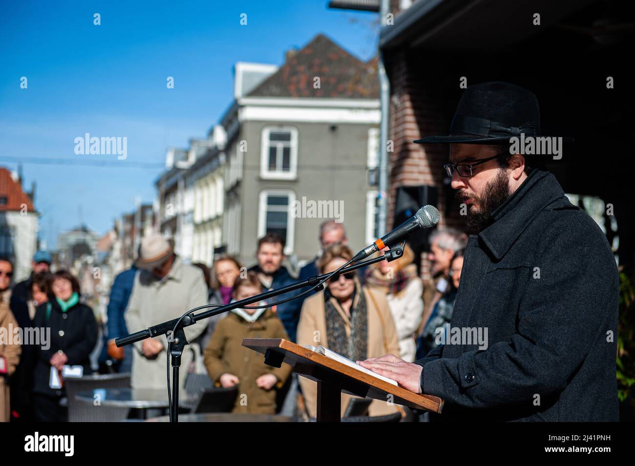 Rabbi Mendel Levine is seen giving a speech during the ceremony. As the ...