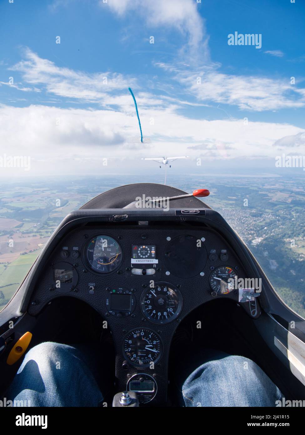 Pilot's eye view from inside a glider cockpit flying over the Cotswolds ...